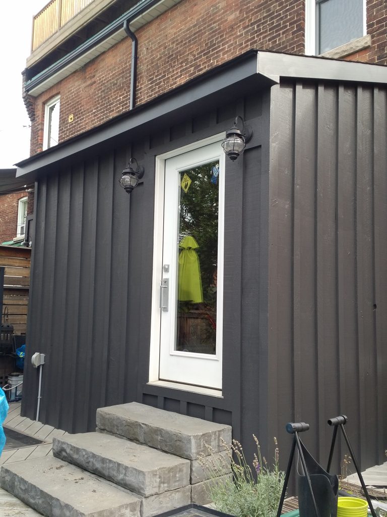 Exterior of mudroom after applying Benjamin Moore Aura Wrought Iron ...